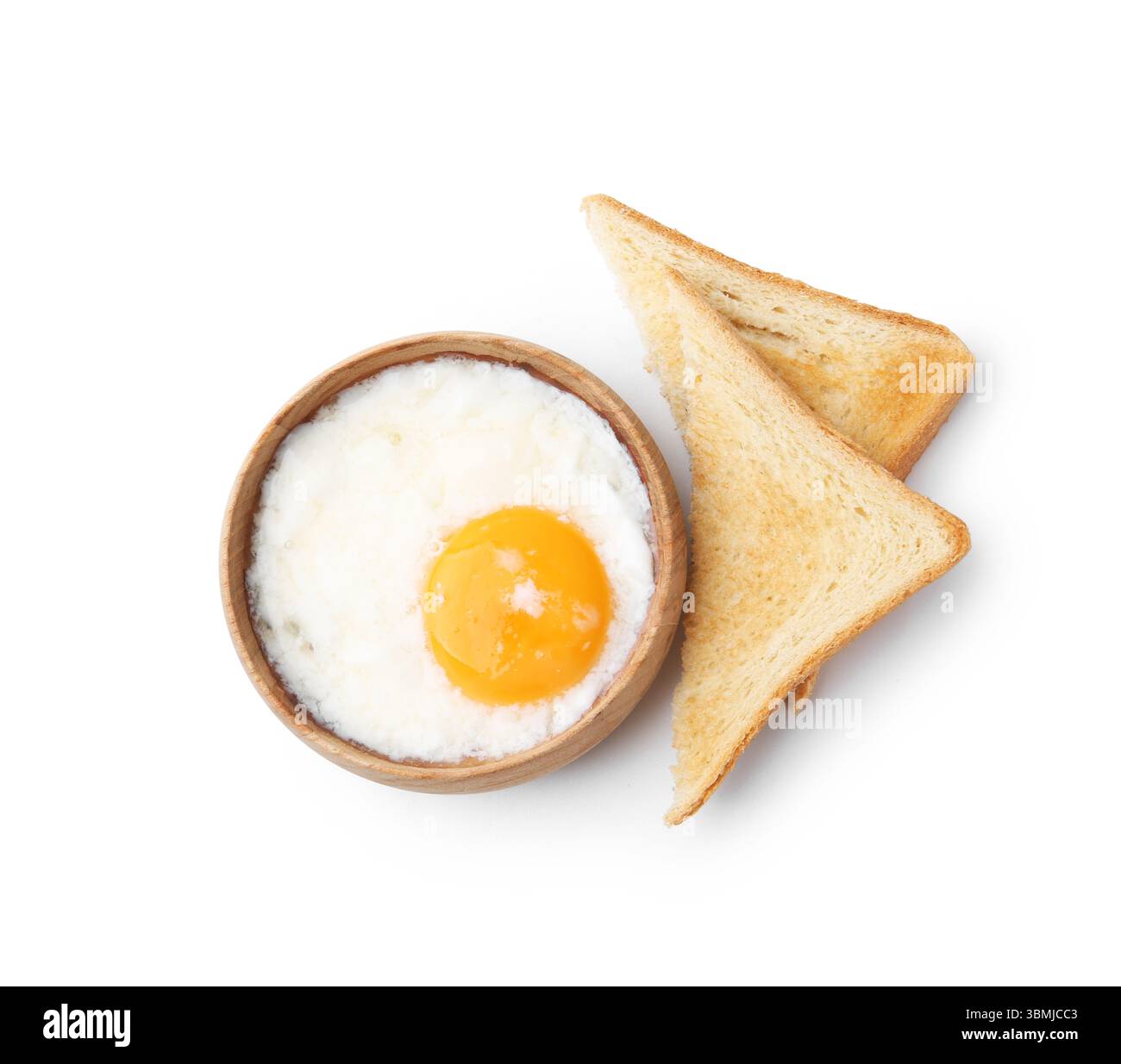 Half-boiled egg in bowl and toasted bread isolated on white, top view ...