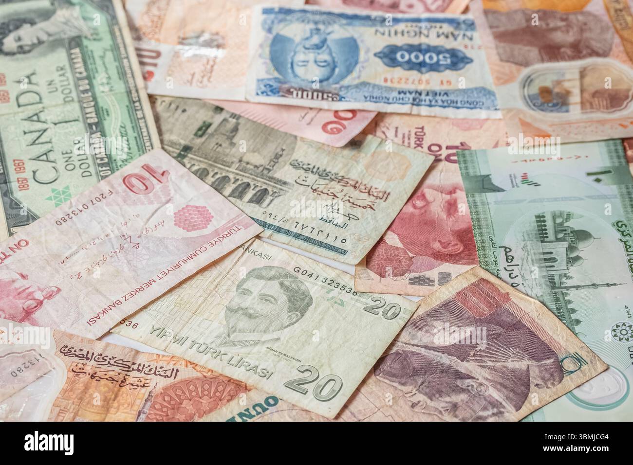 Cash banknotes, paper money from different countries. World Currencies ...
