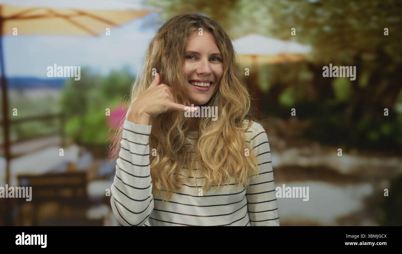 Woman hand calling patio blonde smile hair outdoors young gesture ...
