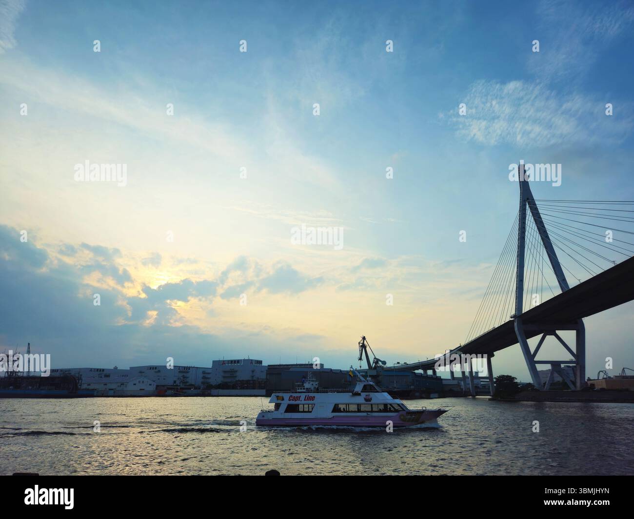 Aji River Sunset with Captain Line Ferry Passing Tempozan Ohashi Bridge ...