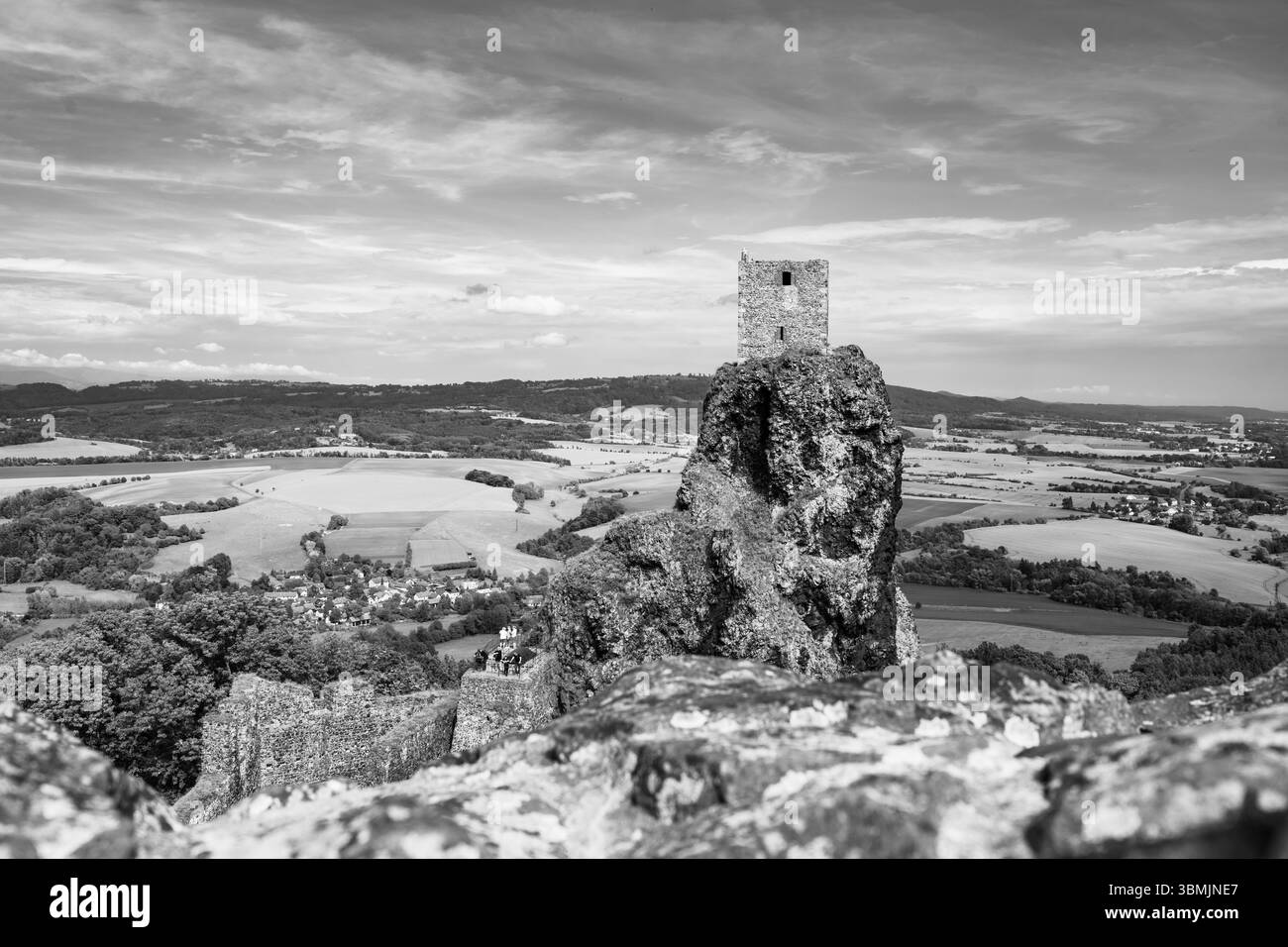 Trosky Castle ruins stand atop a rocky formation, offering a stunning ...