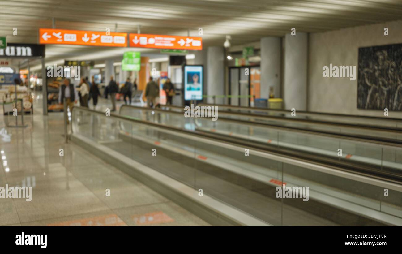 Blurred airport scene defocused travelers hi-res stock photography and ...