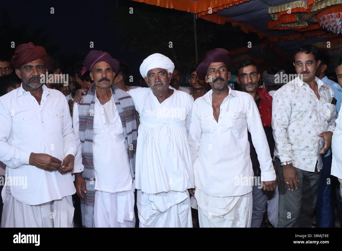 Group of Indian rural men in traditional dress during cultural event in ...