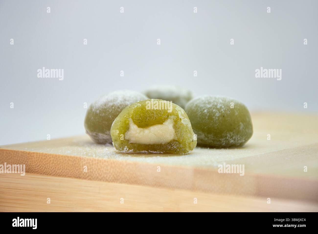 Traditional Japanese sweets mochi with muscat cream filling Stock Photo ...