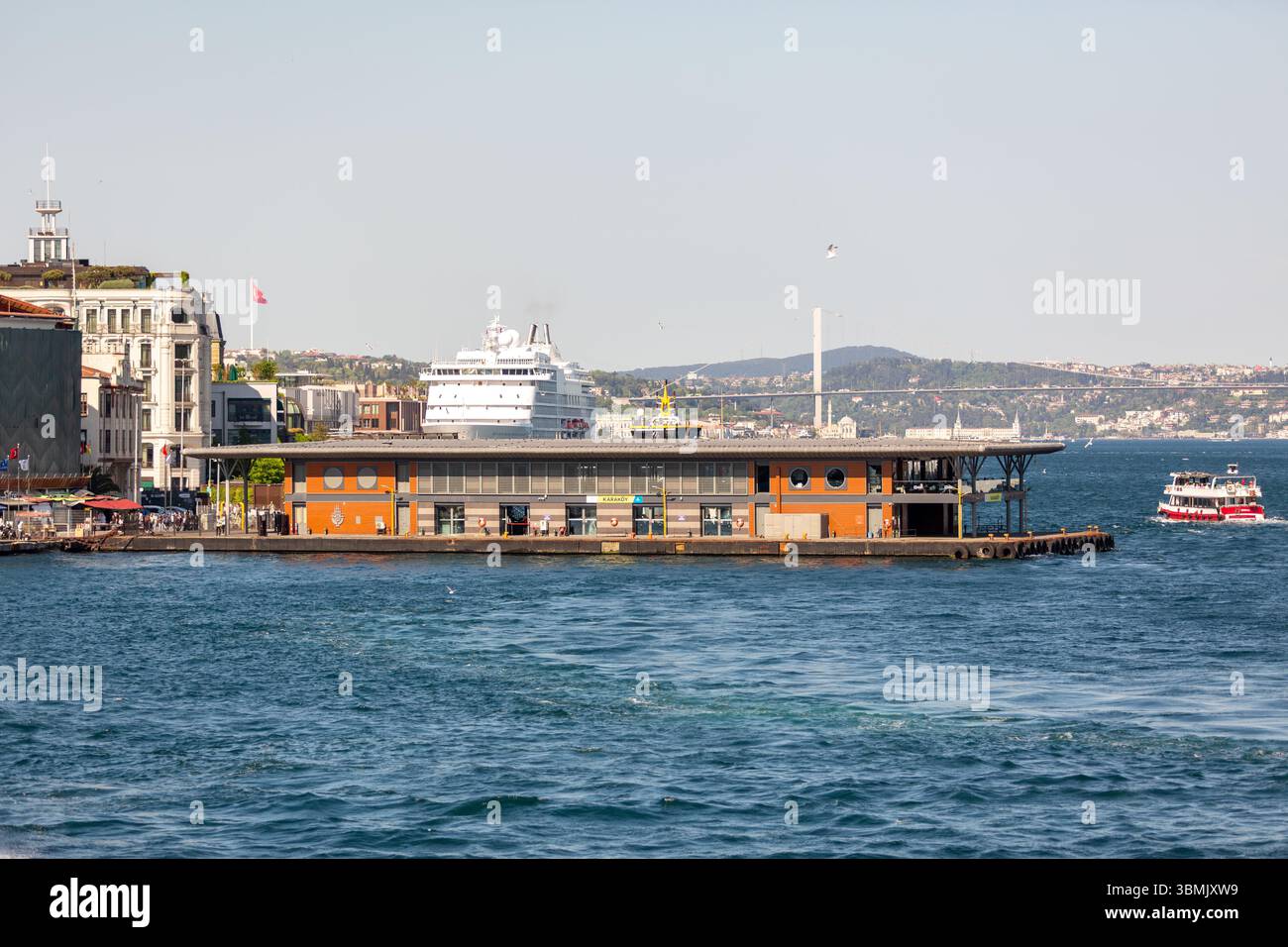 Istanbul, Turkiye - May 12, 2025: Karakoy ferry dock alond the ...