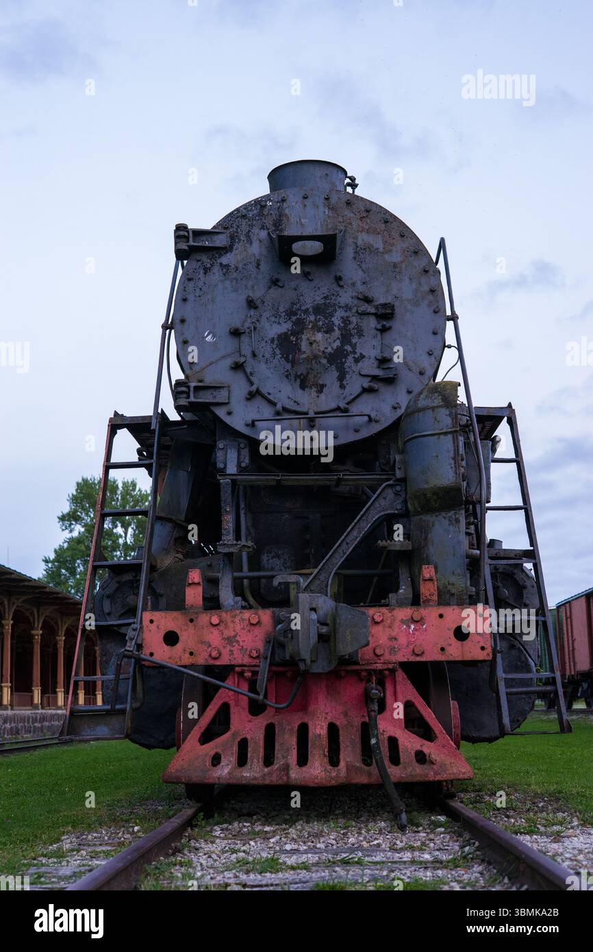 Front view of a vintage black steam locomotive on rails, photographed ...
