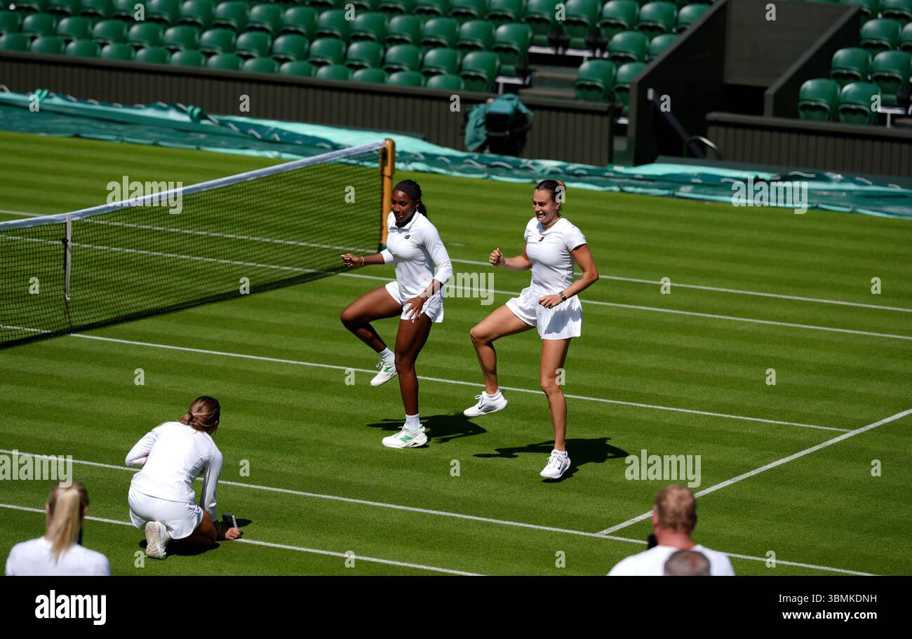Aryna Sabalenka (right) and Coco Gauff (centre right) make Tik Tok's together after practice at ...