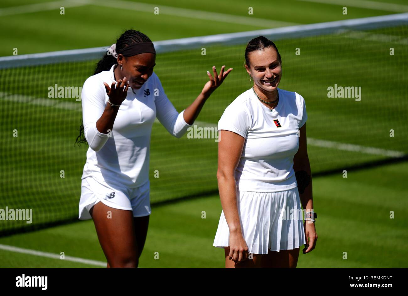 Aryna Sabalenka (right) and Coco Gauff (left) make Tik Tok's together after practice at the All ...