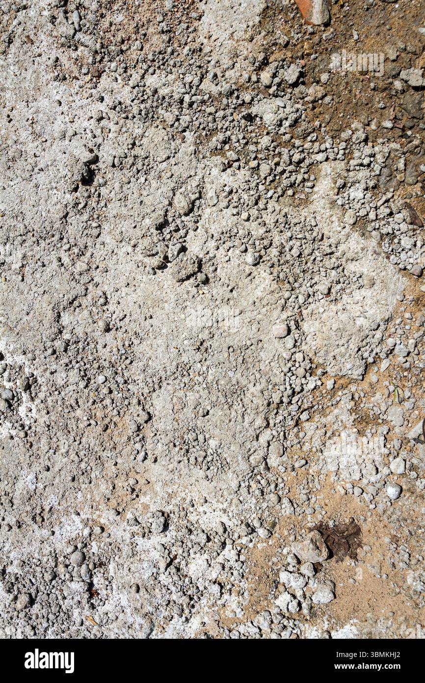Concrete and cement stains on ground. Abstract messy construction ...