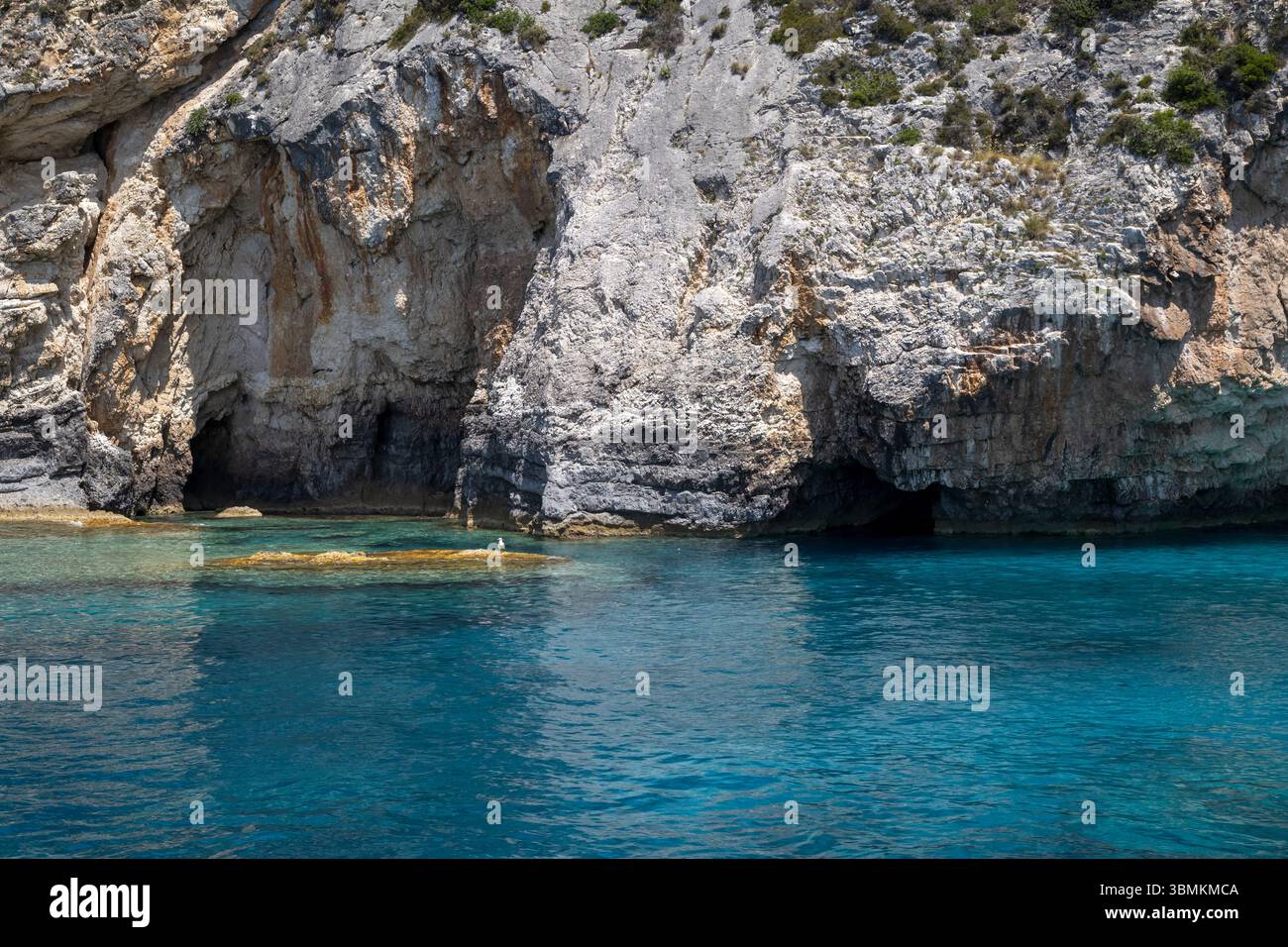 Rocky coast small caves hi-res stock photography and images - Alamy