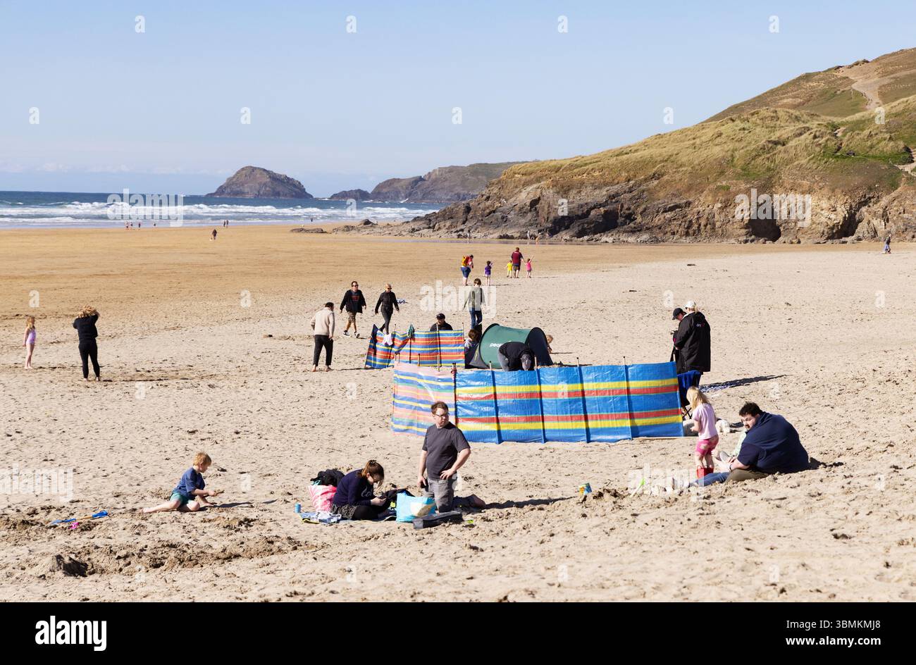 Perranporth beach Cornwall beach; people enjoying spring sunshine on ...