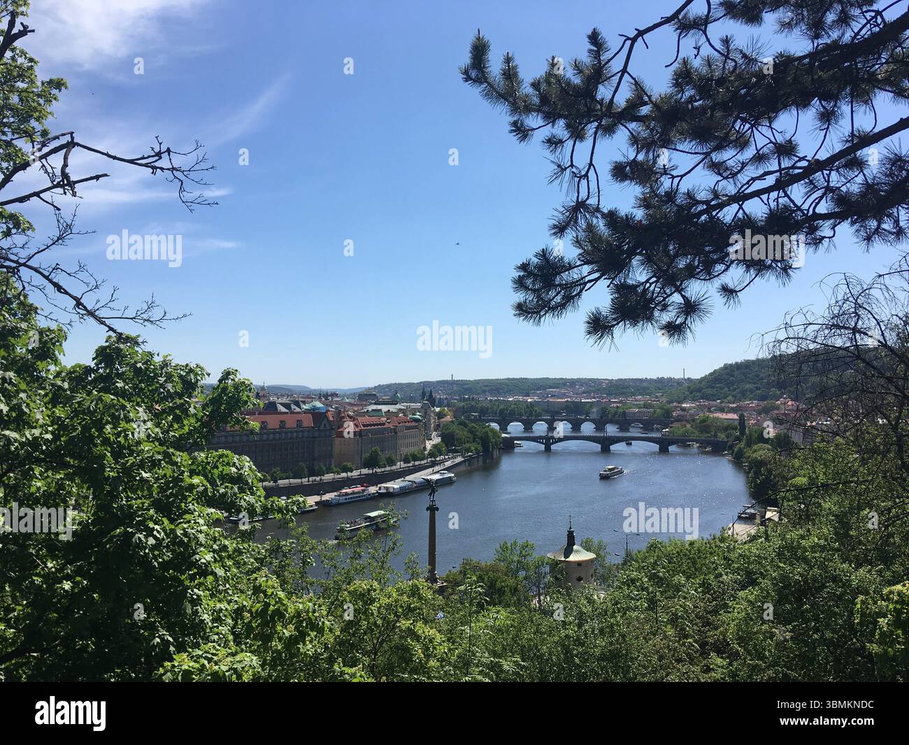 The Vltava River winds through Prague’s historic centre, bordered by ...