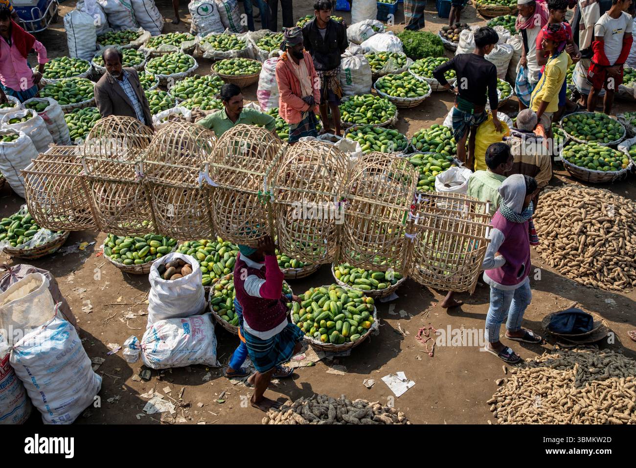 A vendor crying bamboo fish traps for sale at the weekly Baishmouja ...