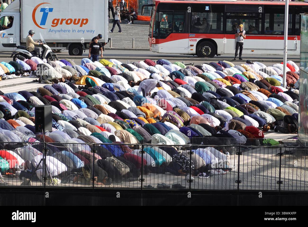 Muslims praying on Eid in Naples Stock Photo - Alamy
