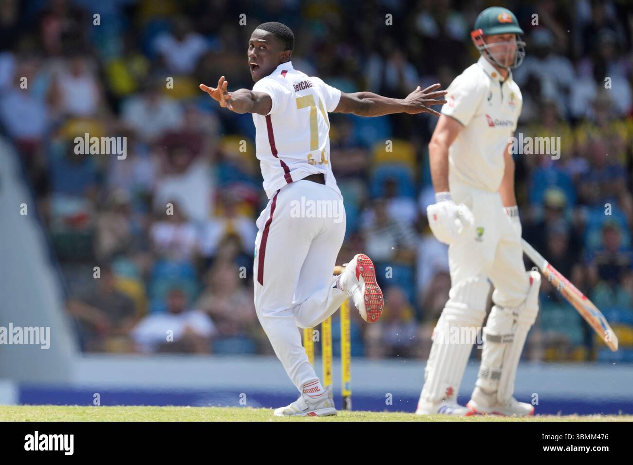 West Indies' bowler Shamar Joseph reacts after a delivery to Australia ...