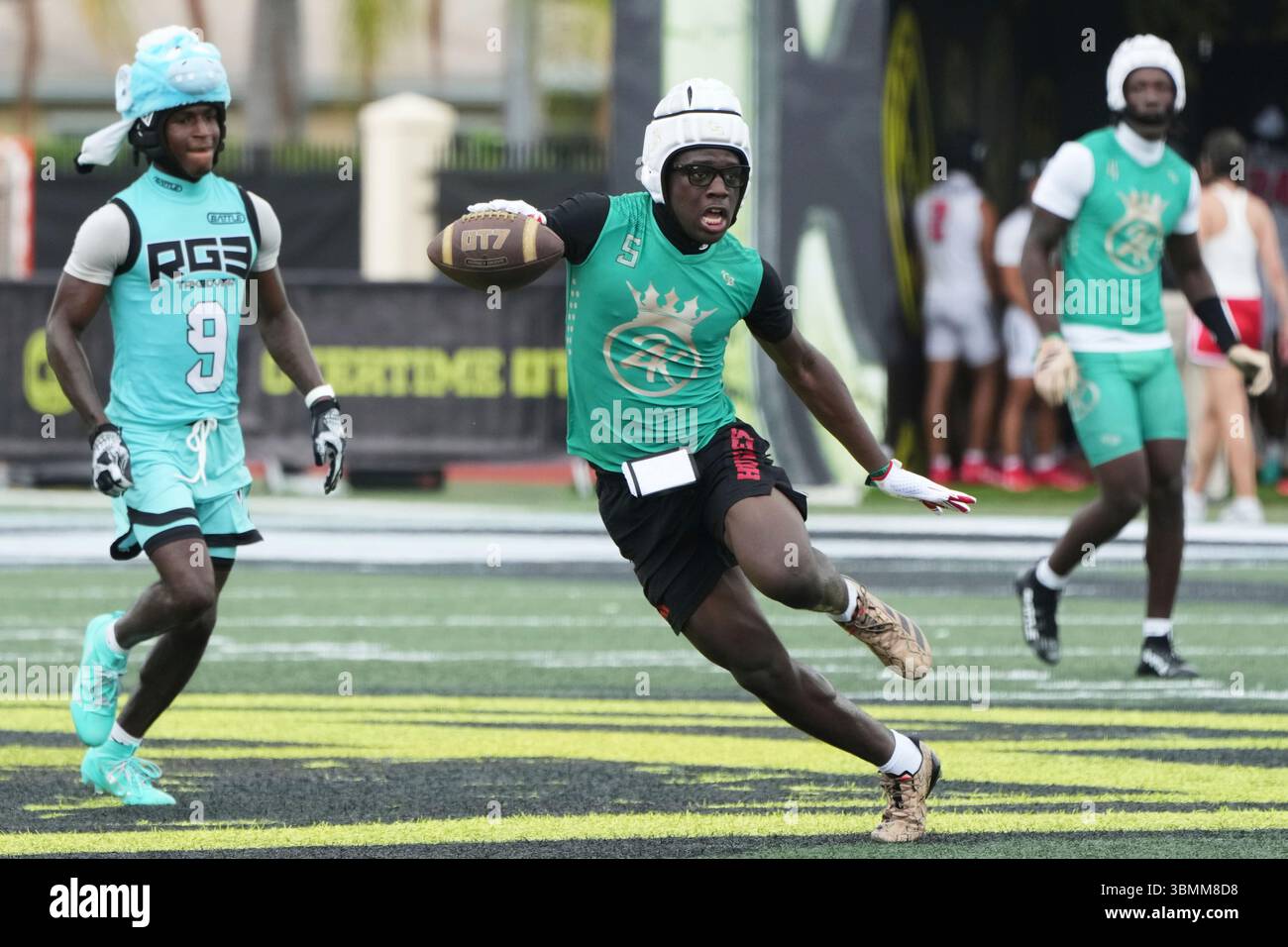 24K wide receiver Larry Miles (5) runs with the football during an OT7 ...