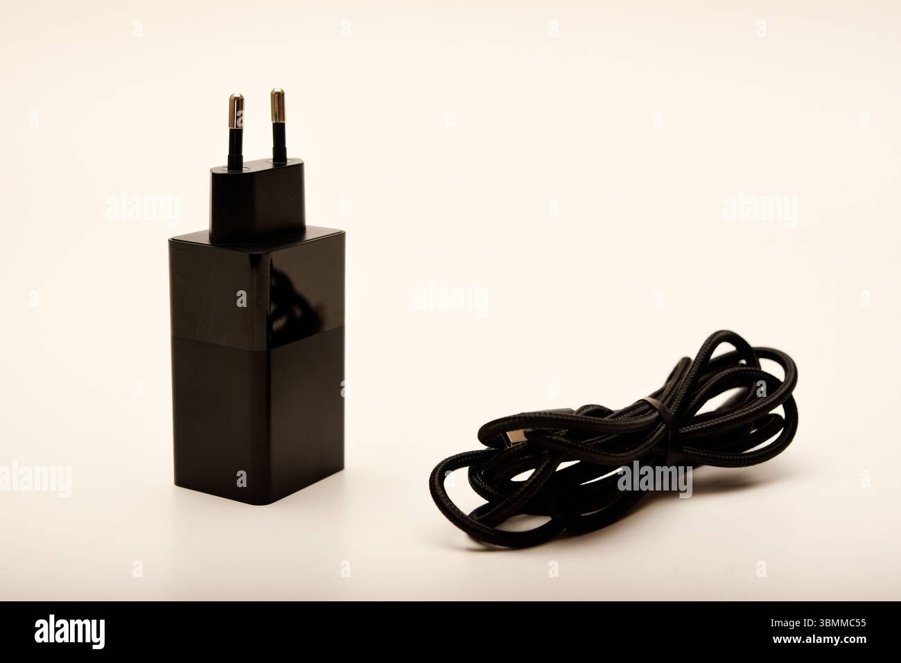 A new charger for gadgets with a wire. USB charging with a wire Stock ...