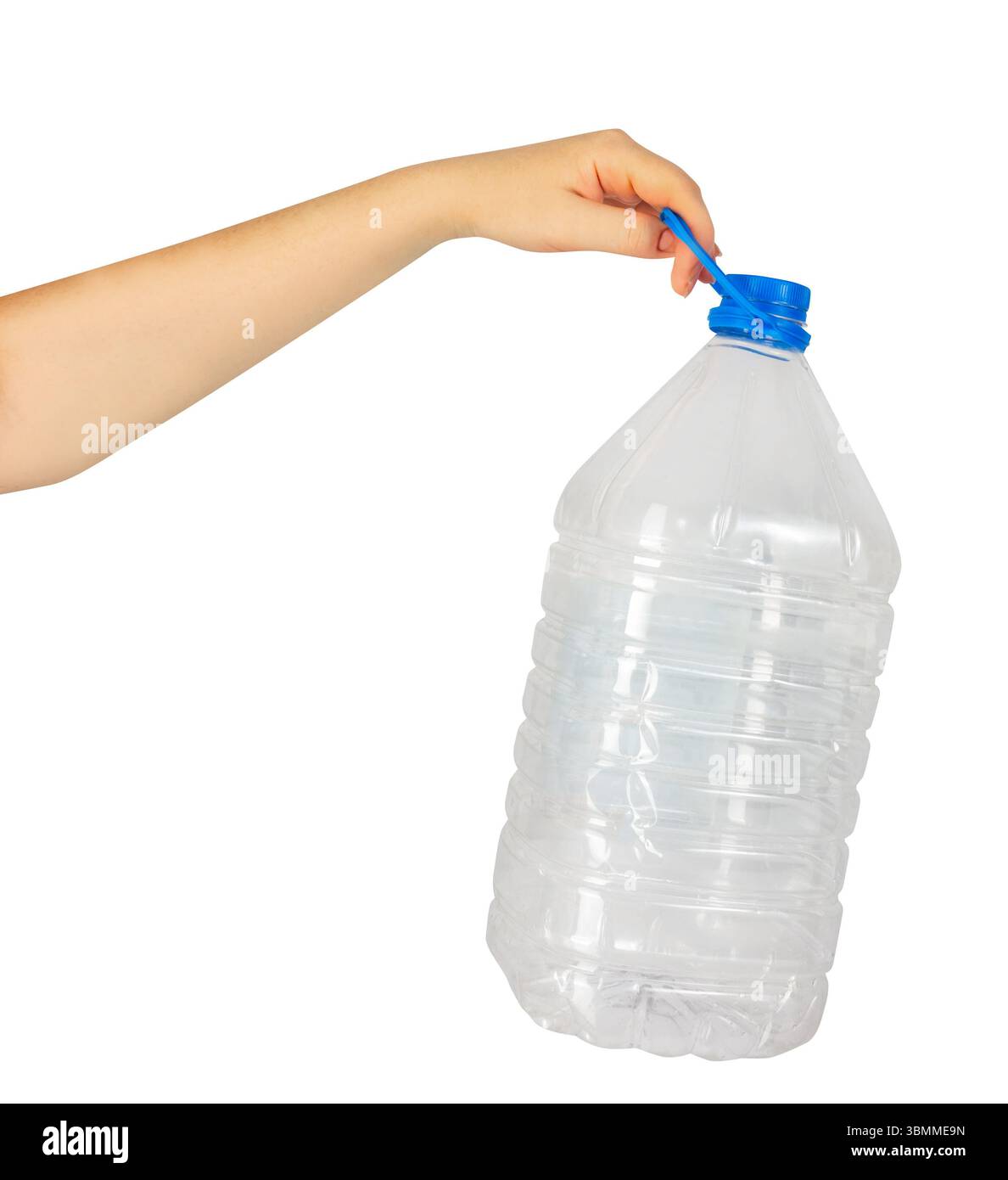 Isolated photo of female hand holding 5 litre or 1,32 gallon plastic ...