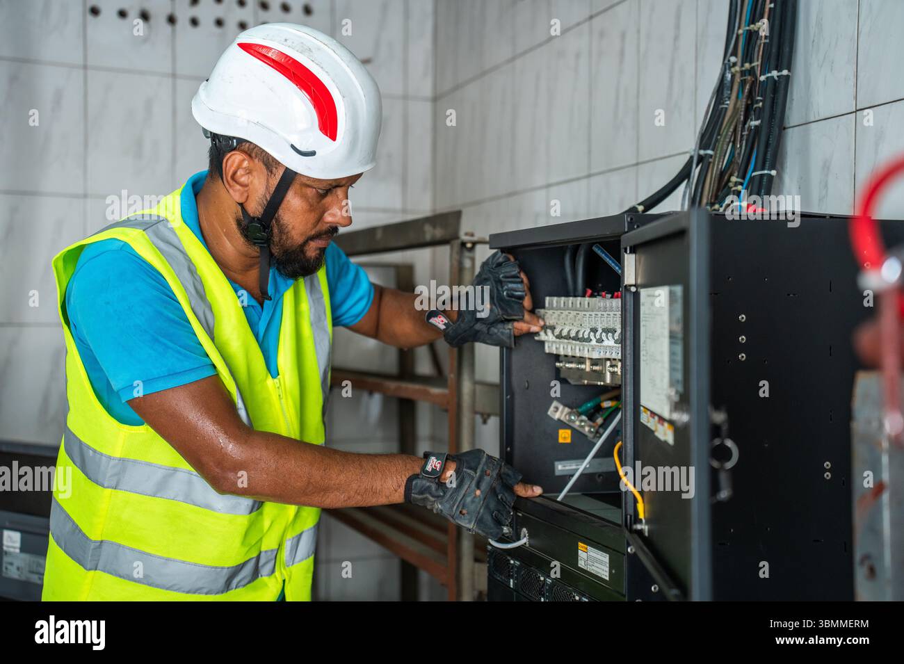 Technician and engineer team fixing network devices, routers ...