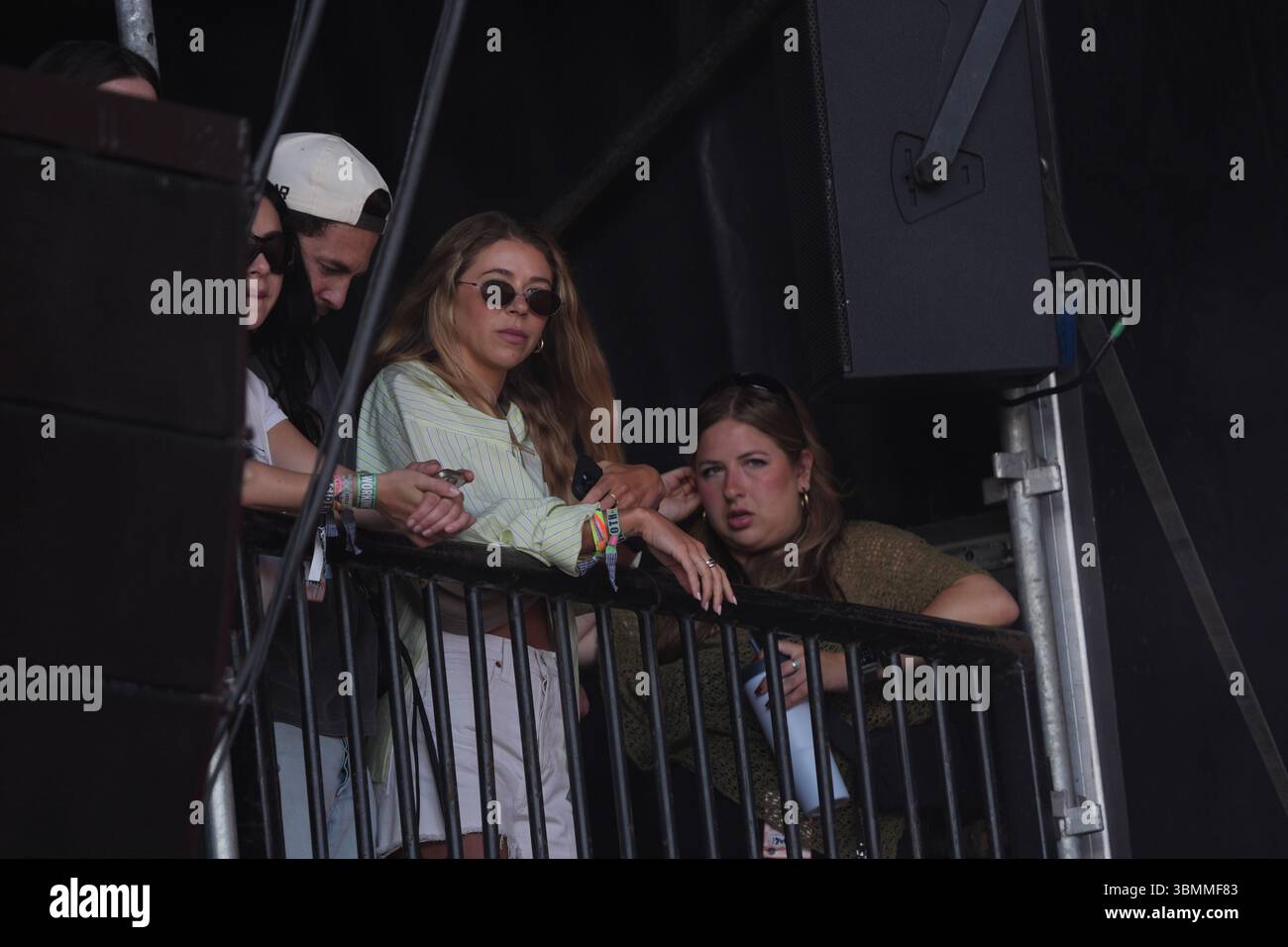 Charlie XCX (left) watches as Gracie Abrams performs on the Other stage ...