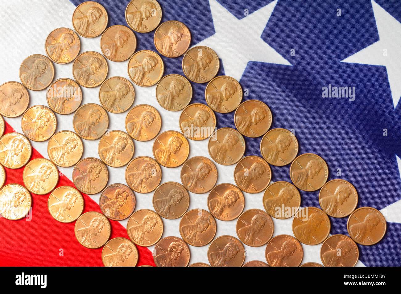 Photo of USA one cent or penny coin collection laying on american flag ...