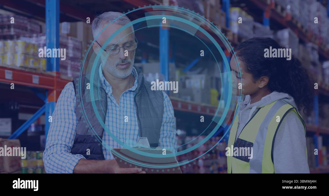In warehouse, workers discussing logistics with digital data protection ...