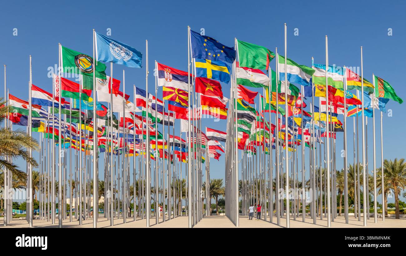 Many world's countries national flags waving on the wind, with UN, EU ...