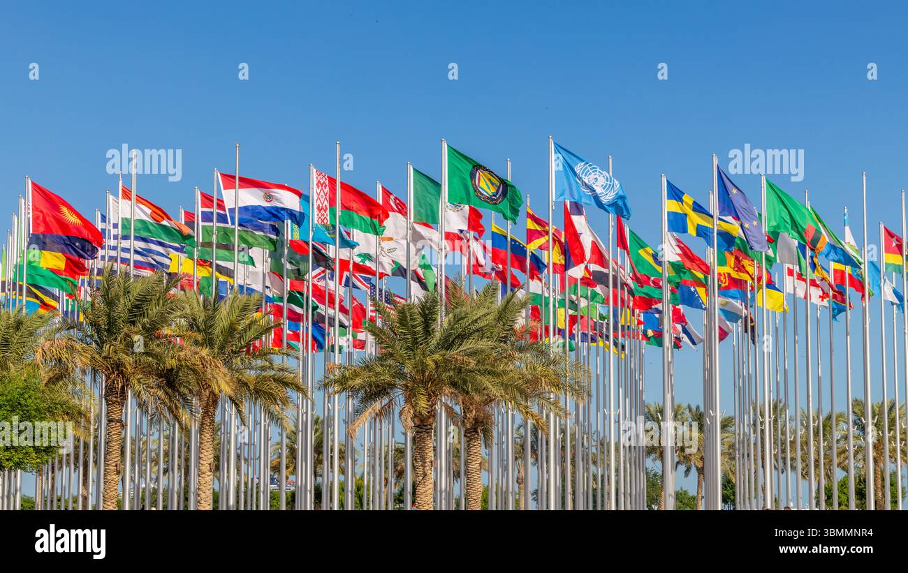 Many world's countries national flags waving on the wind, with UN, EU ...