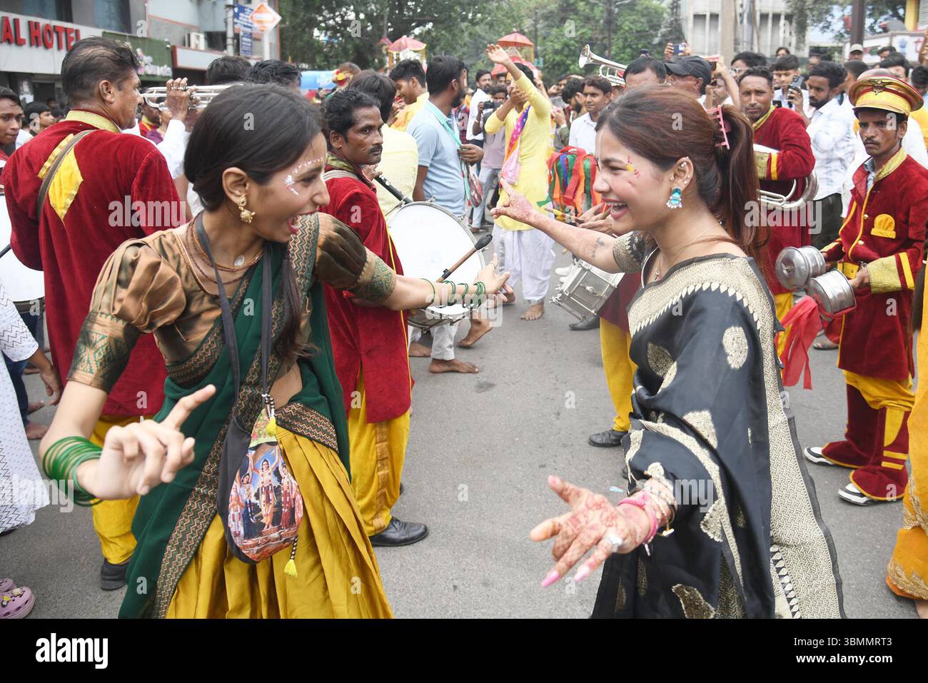 PATNA, INDIA - JUNE 27: Devotees performing during Rath Yatra of lord ...