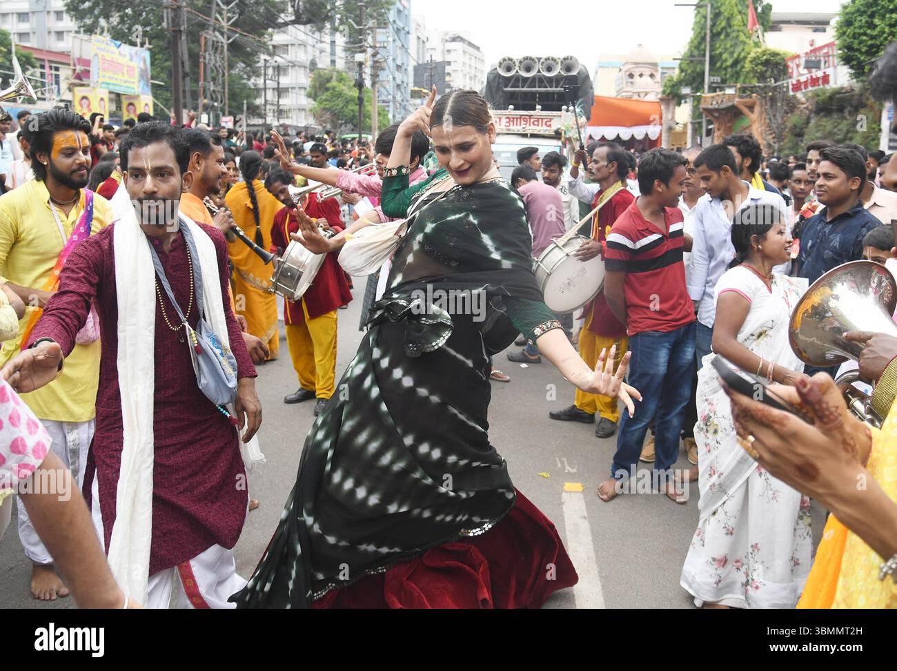 PATNA, INDIA - JUNE 27: Devotees performing during Rath Yatra of lord ...