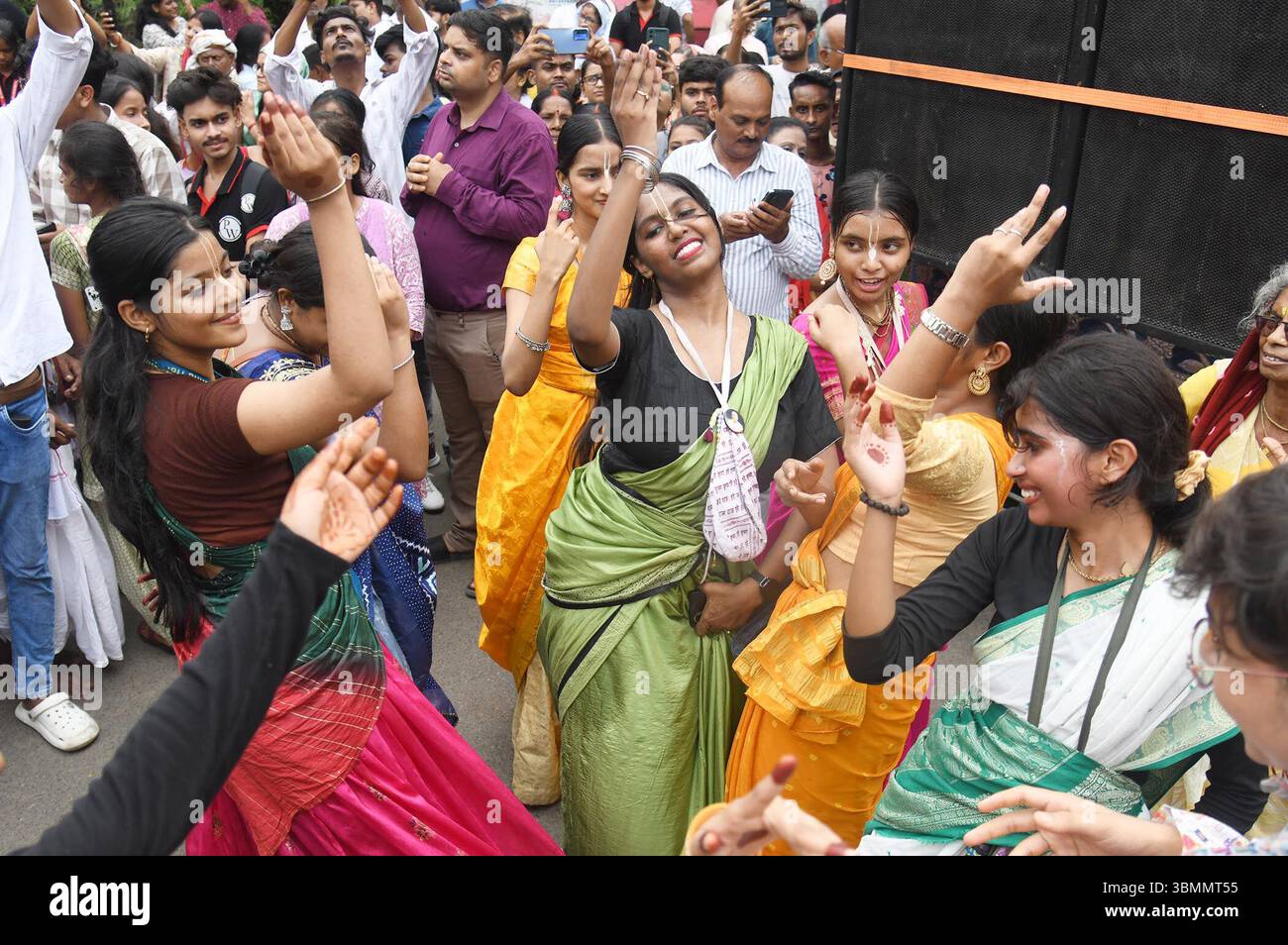 PATNA, INDIA - JUNE 27: Devotees performing during Rath Yatra of lord ...