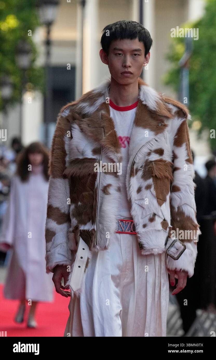 A model wears a creation as part of the men's Kenzo Spring-Summer 2026 collection, that was ...