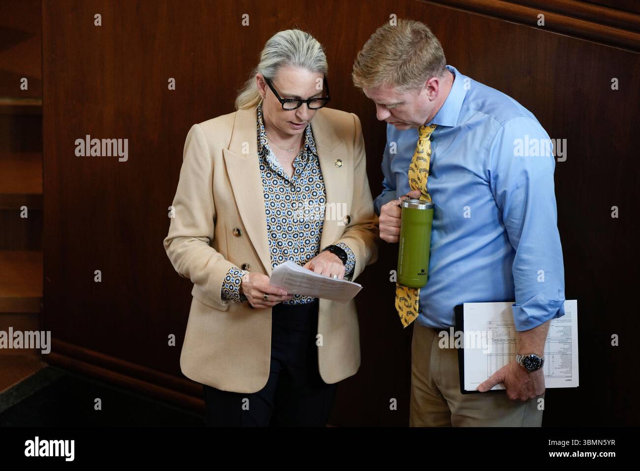 Democratic Senate Majority Leader Kate Lieber, left, talks with Oregon ...
