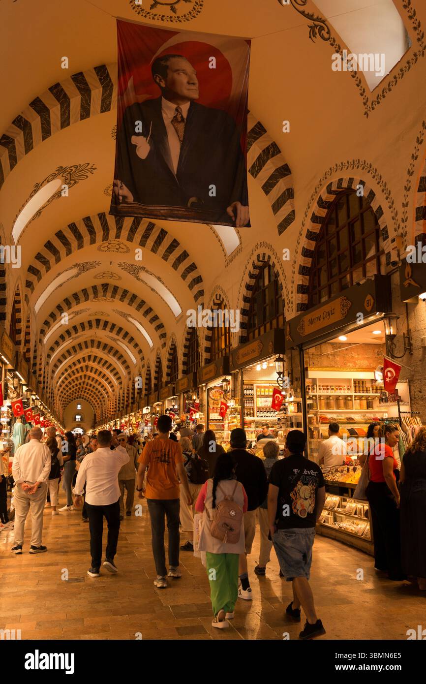 Crowds move through the Grand Bazaar in Istanbul, surrounded by shops ...