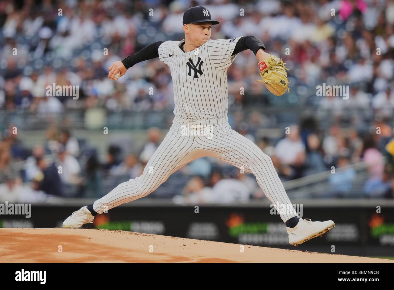 New York Yankees' Will Warren pitches during the first inning of a ...