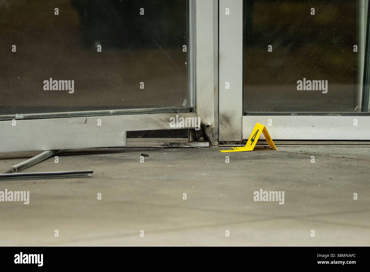 Residue from an explosion is pictured outside of MLA Bowinn Ma's office ...