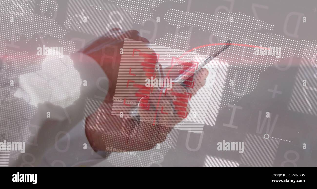 Pointing stylus hand wearing suit cuff interacting with tablet at desk ...