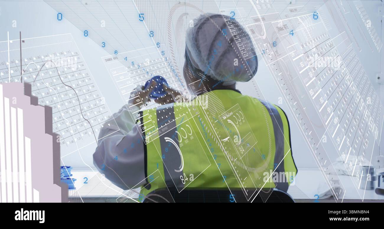 Pipetting lab tech wearing lab coat hi-vis vest at lab bench with ...