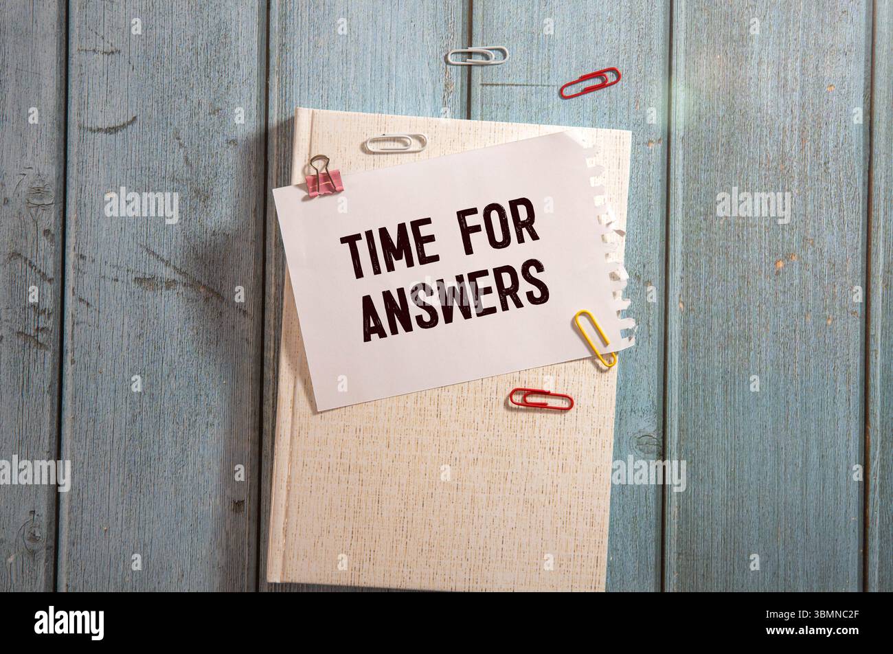 Time for answers words written on ripped yellow paper with red ...