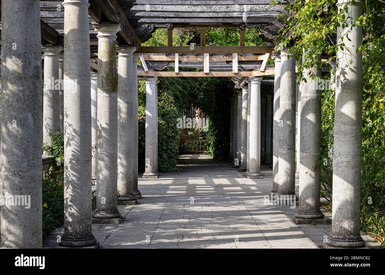 London, UK - Jun 25, 2025 - Classical-style columns and a raised ...
