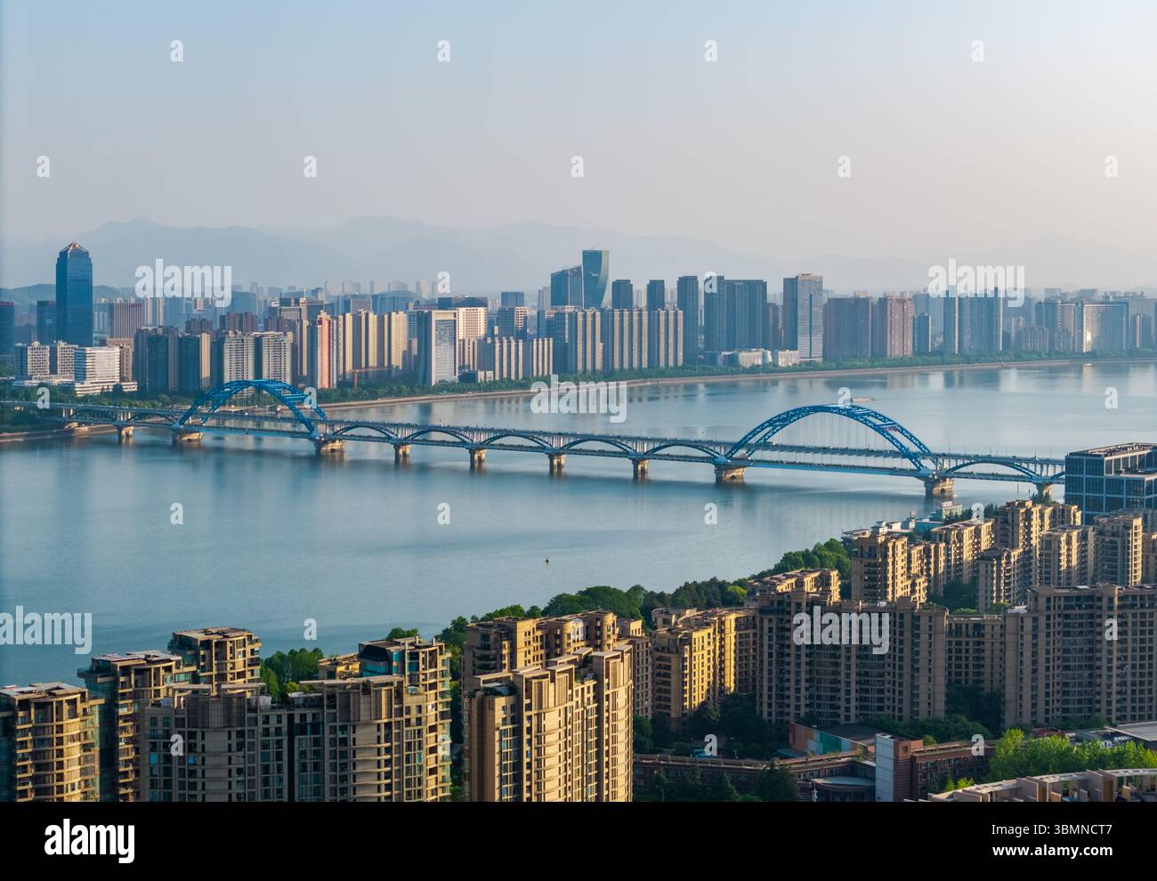 Aerial view of a sprawling urban landscape with modern buildings, a ...