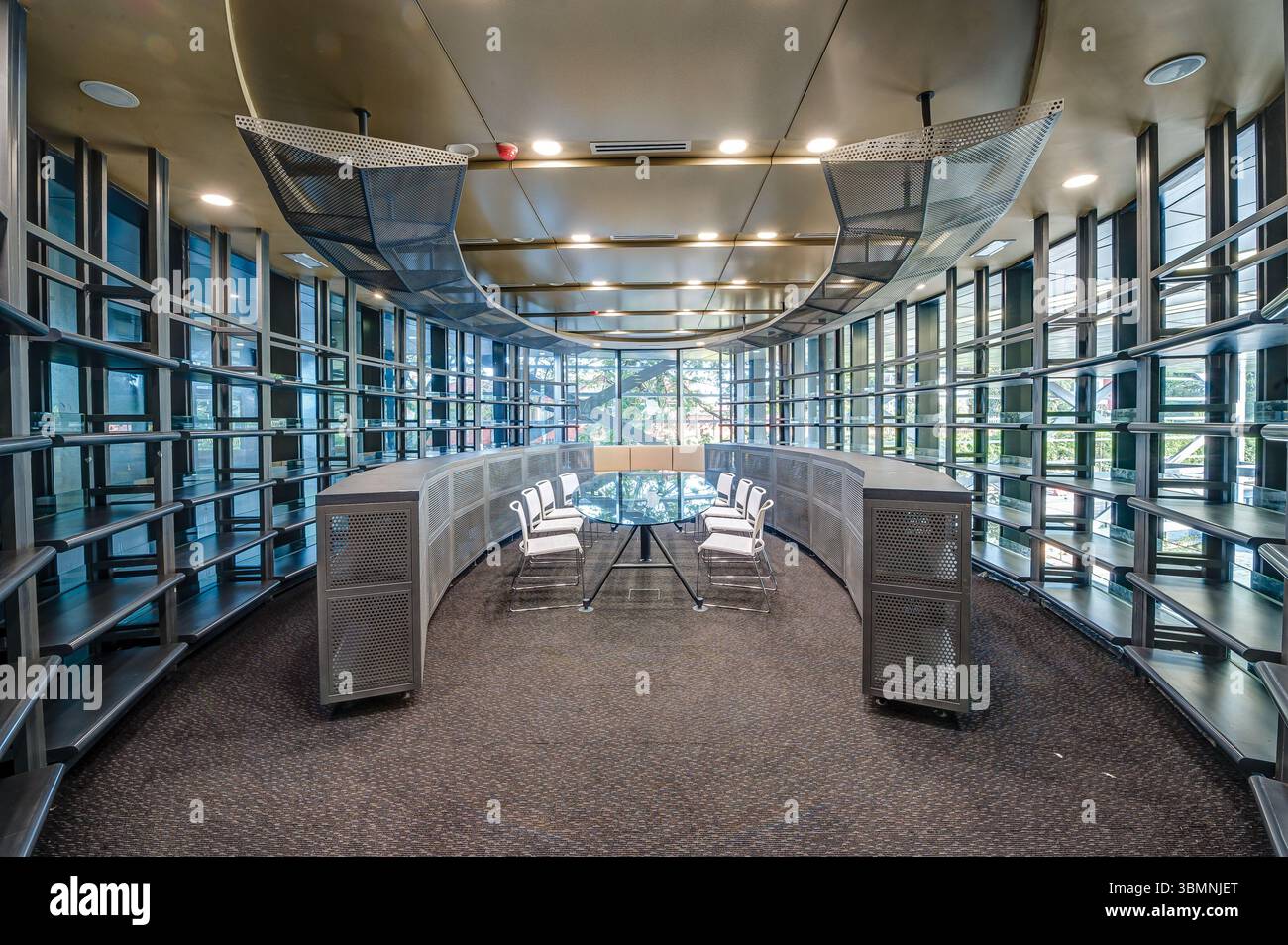 modern space area counter with display rack, table and chairs Stock ...