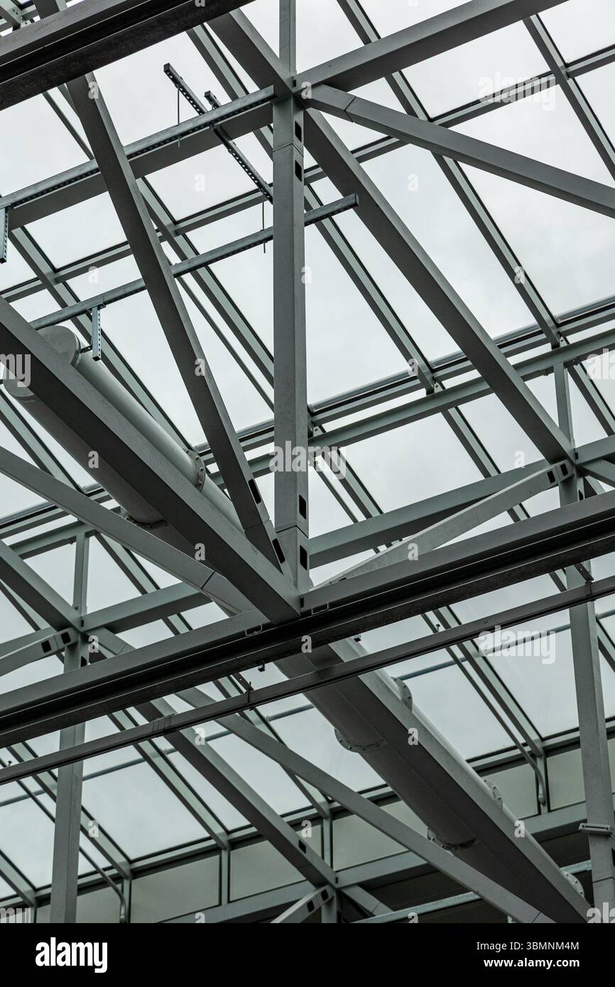 Steel roof structure creating a repeating geometric pattern with ...