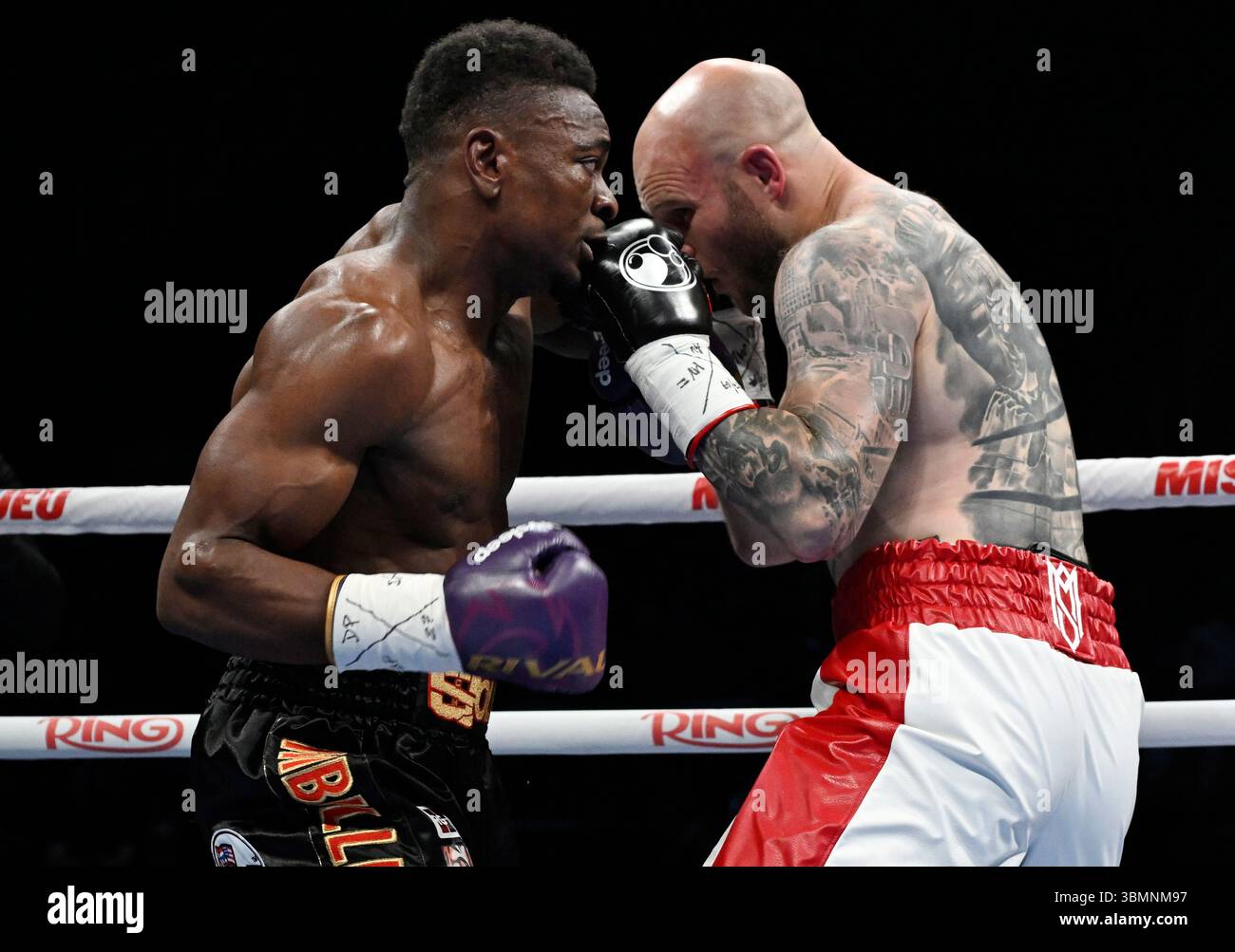 Quebec, Canada. 27th June, 2025. Christian Mbilli, left, punches Maciej ...
