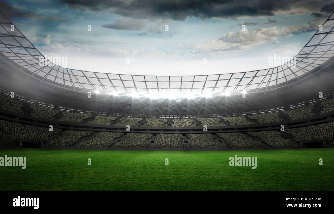 Empty grass turf is showing stadium seating under floodlit cantilever ...