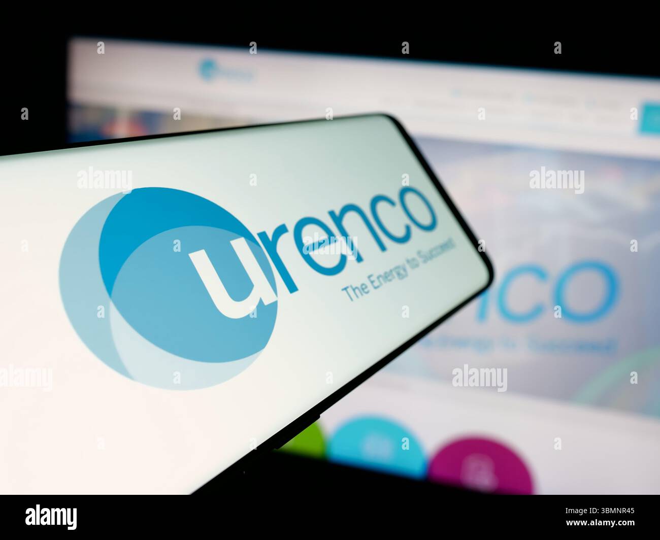 In this photo illustration, a smartphone with the logo of nuclear fuel ...
