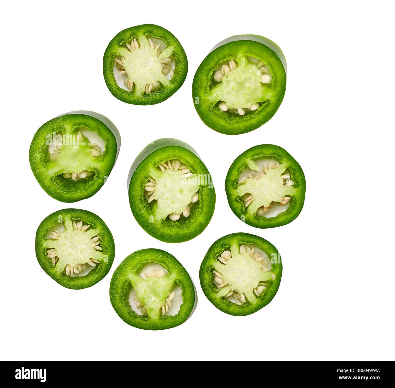 green jalapeno chili pepper cut in pieces isolated on white background ...