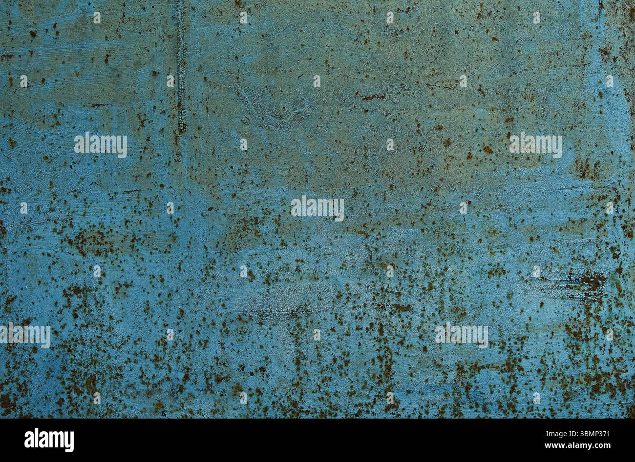 Grunge background with old peeling blue paint. Corrosion of iron with ...