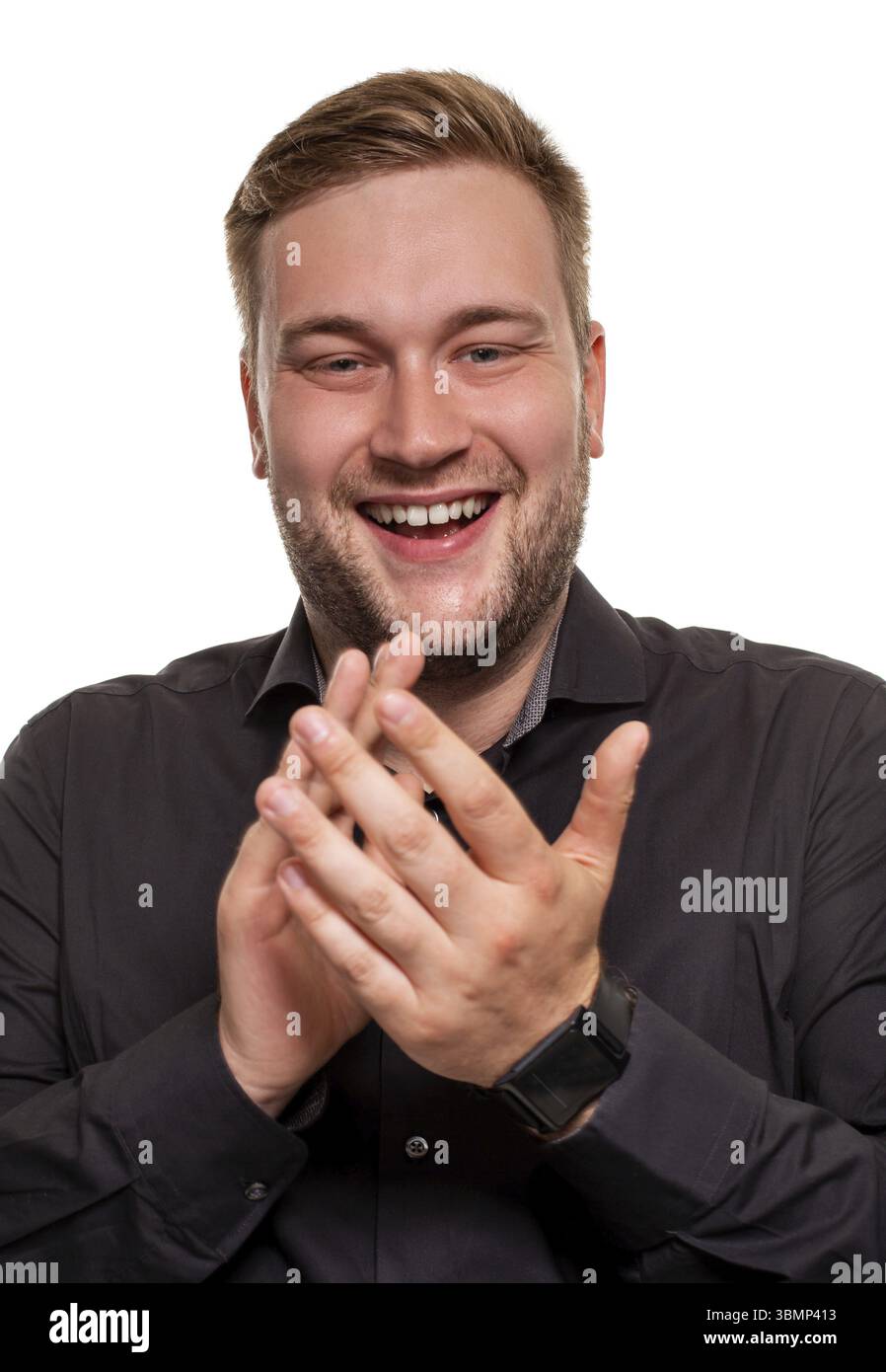 Thrilled excited and over-emotive attractive happy guy smiling broadly ...