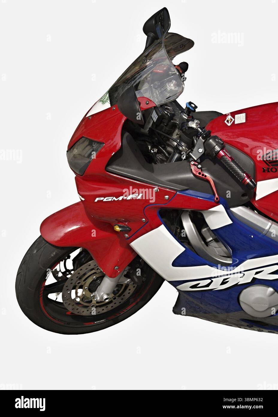 Red, white and blue Honda CBR motorcycle ready for a thrilling ride ...